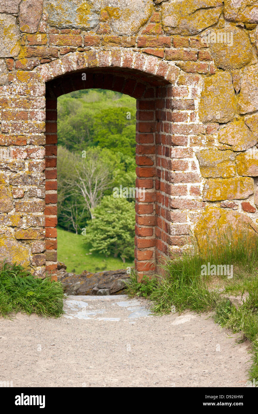 Old brick gate with an arch Stock Photo - Alamy
