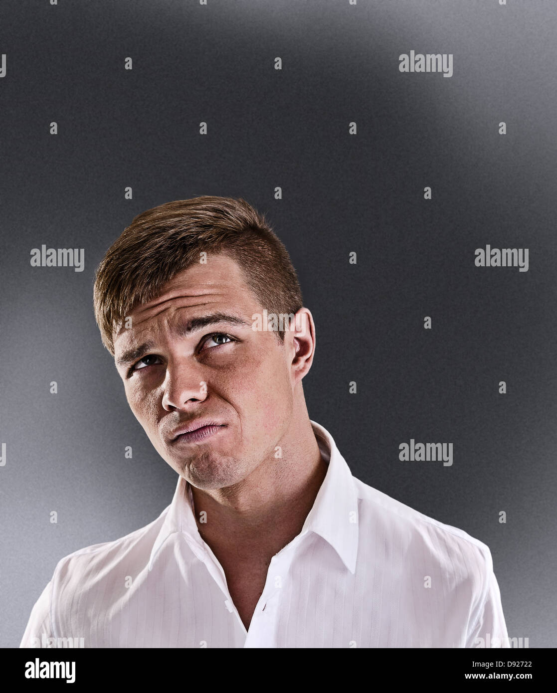 Portrait of a surprised and incredulous man on a black background Stock ...