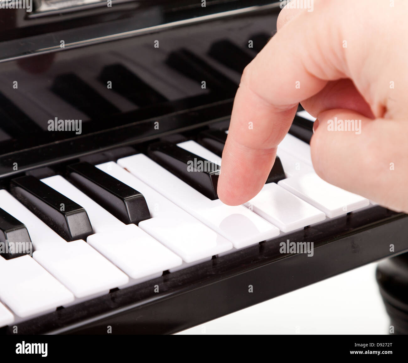 arm bent over the keyboard musical instrument Stock Photo - Alamy