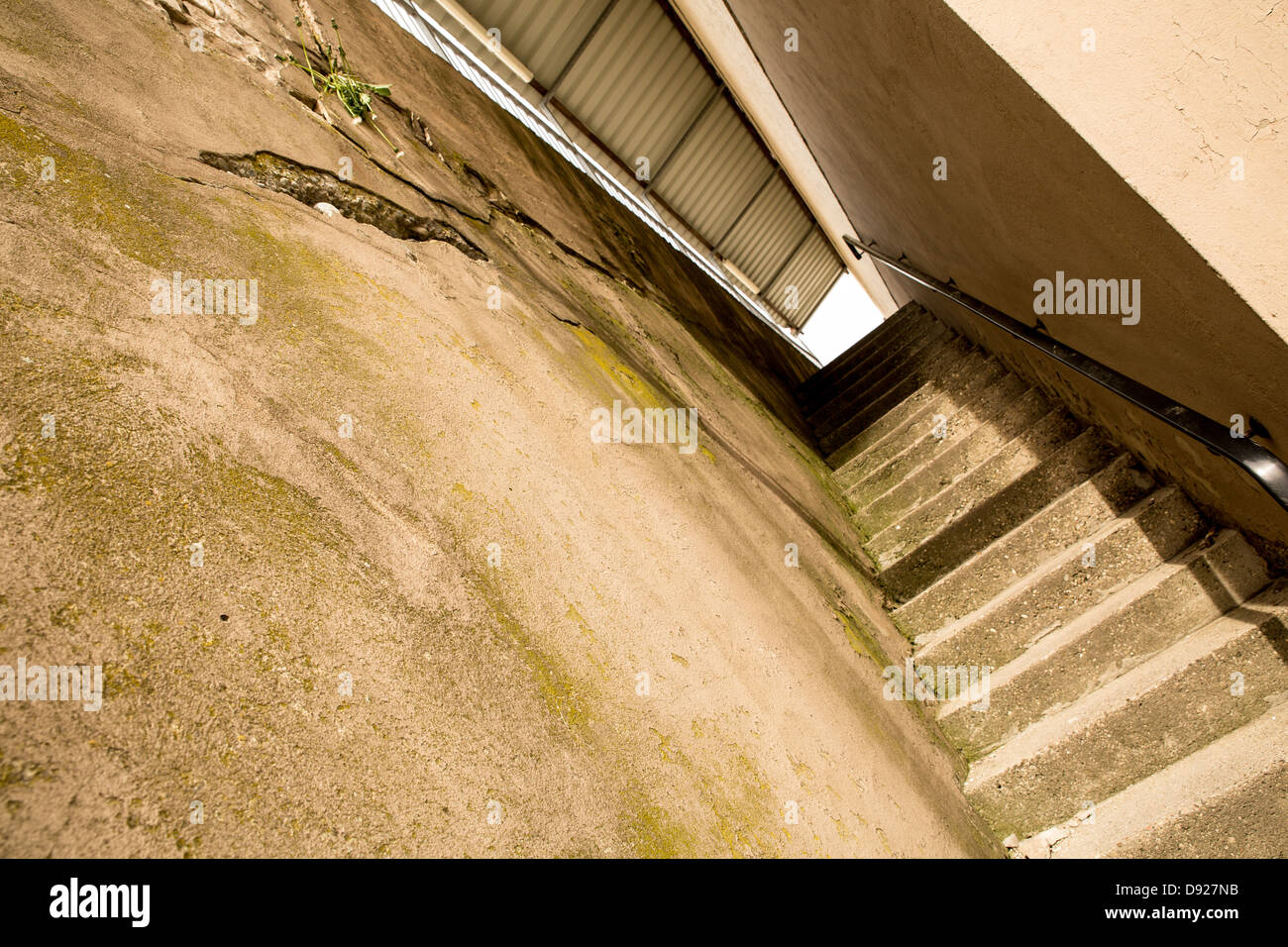 Old concrete stairs between two walls Stock Photo - Alamy