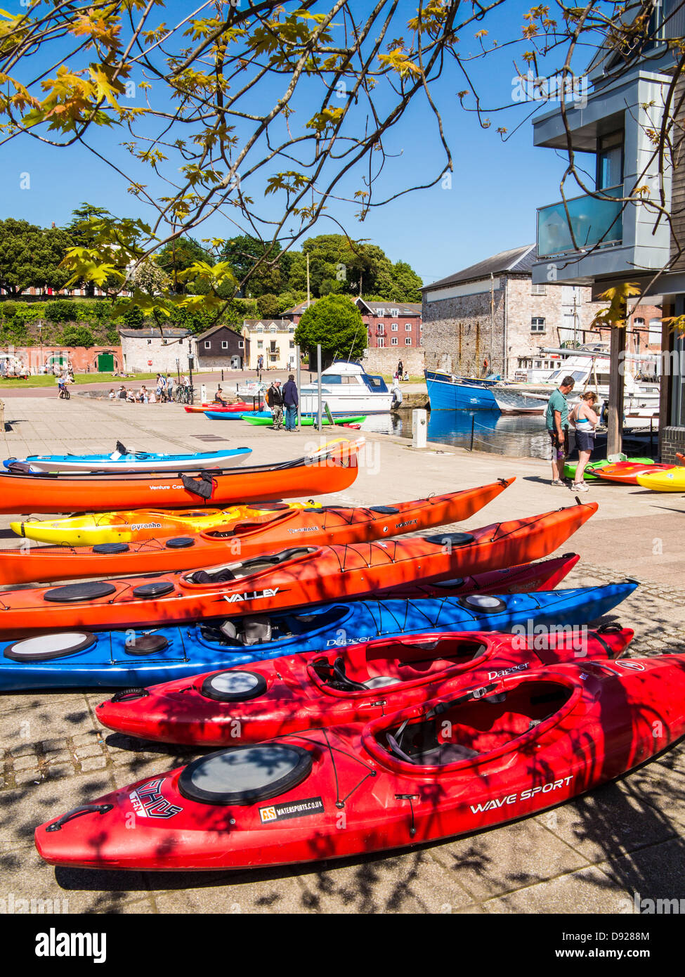 Canoes and kayaks on Exeter Quay beside the river Exe, Exeter, Devon ...