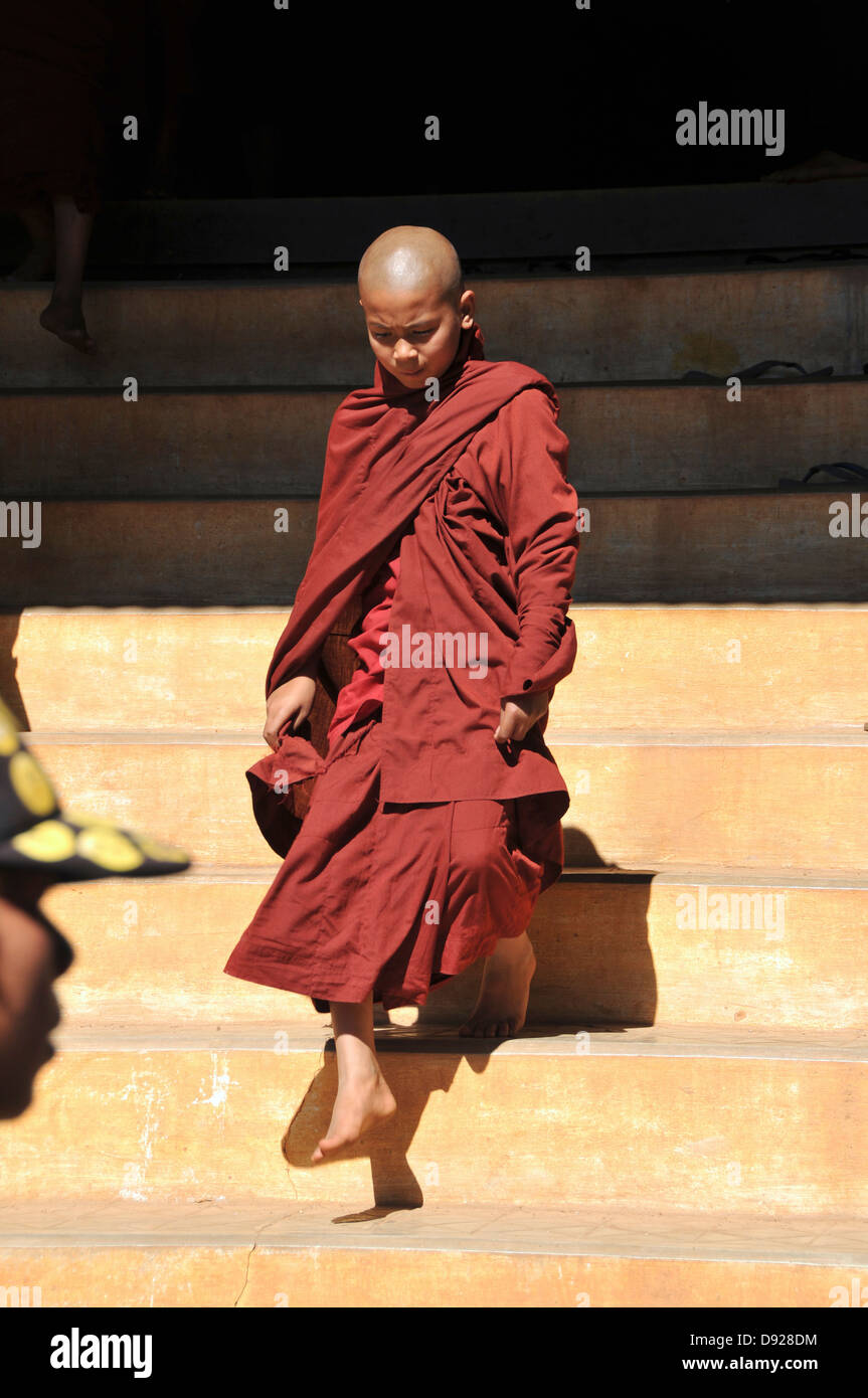 Buddhist Monk leaving a Monastery for December full moon festival ...