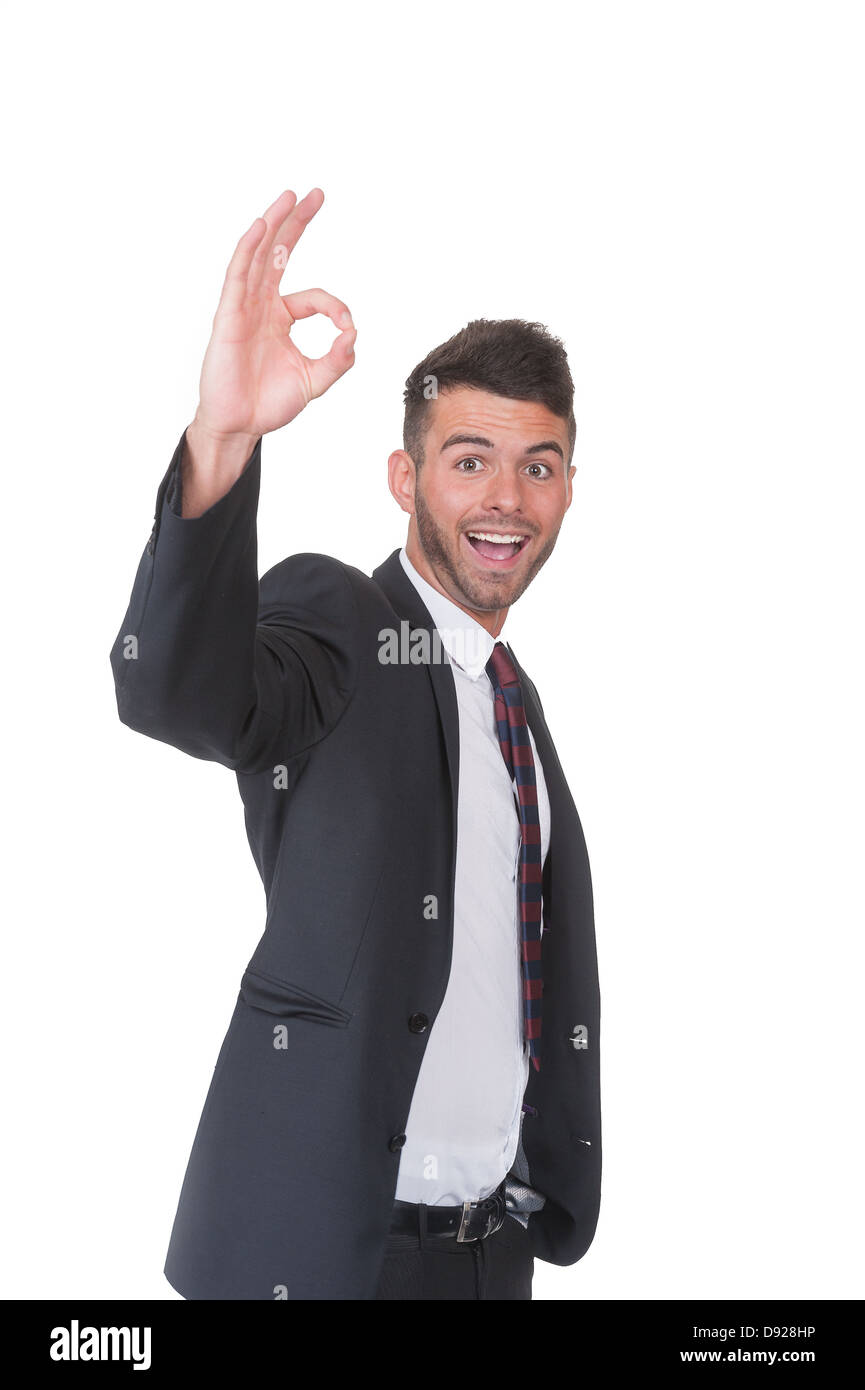 Happy young businessman makes OK sign, isolated on white Stock Photo ...