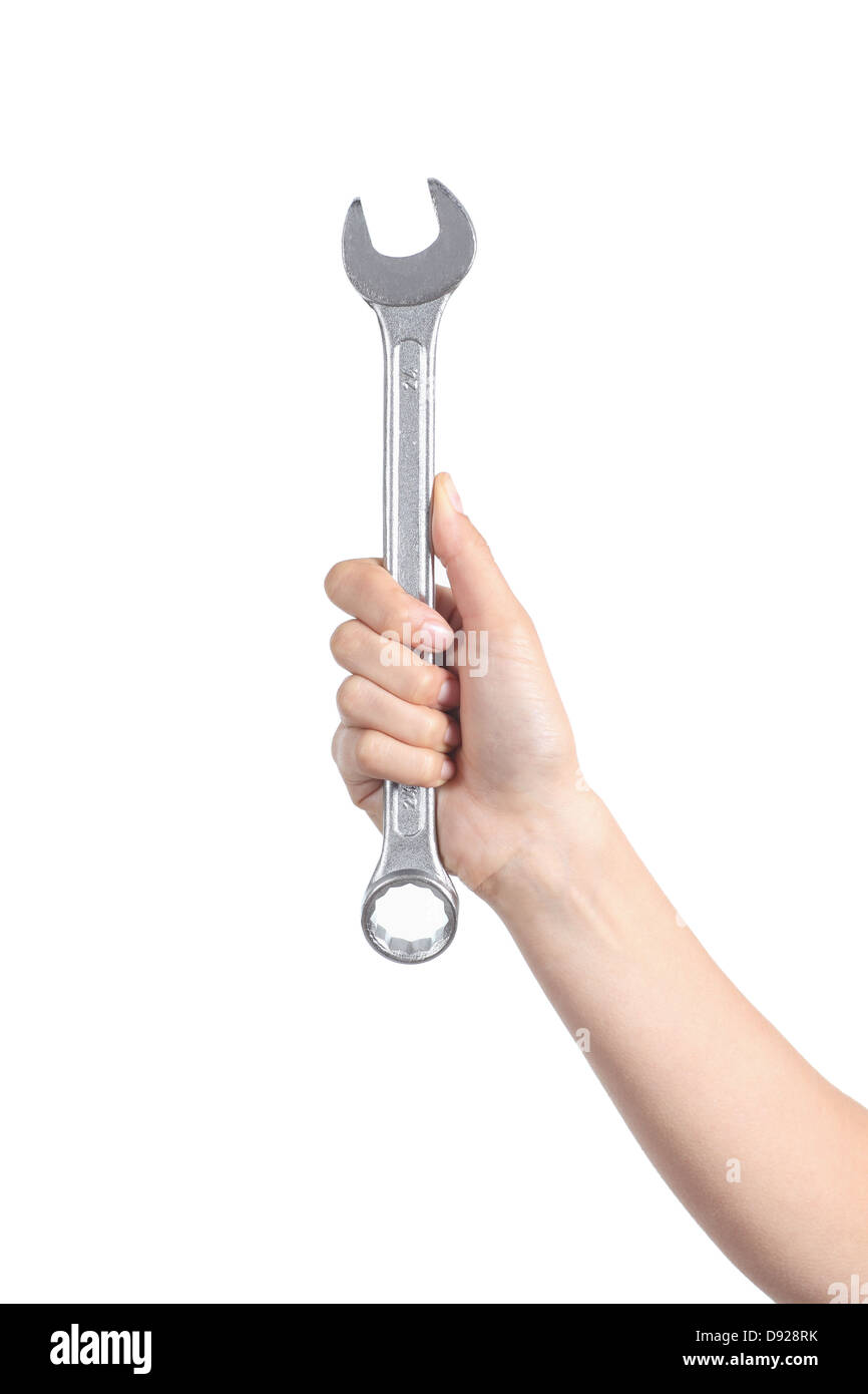 Woman hand holding a spanner isolated on a white background Stock Photo ...