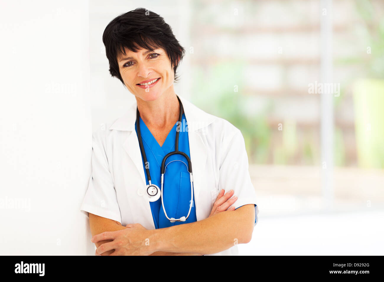 pretty female middle aged hospital worker portrait Stock Photo - Alamy