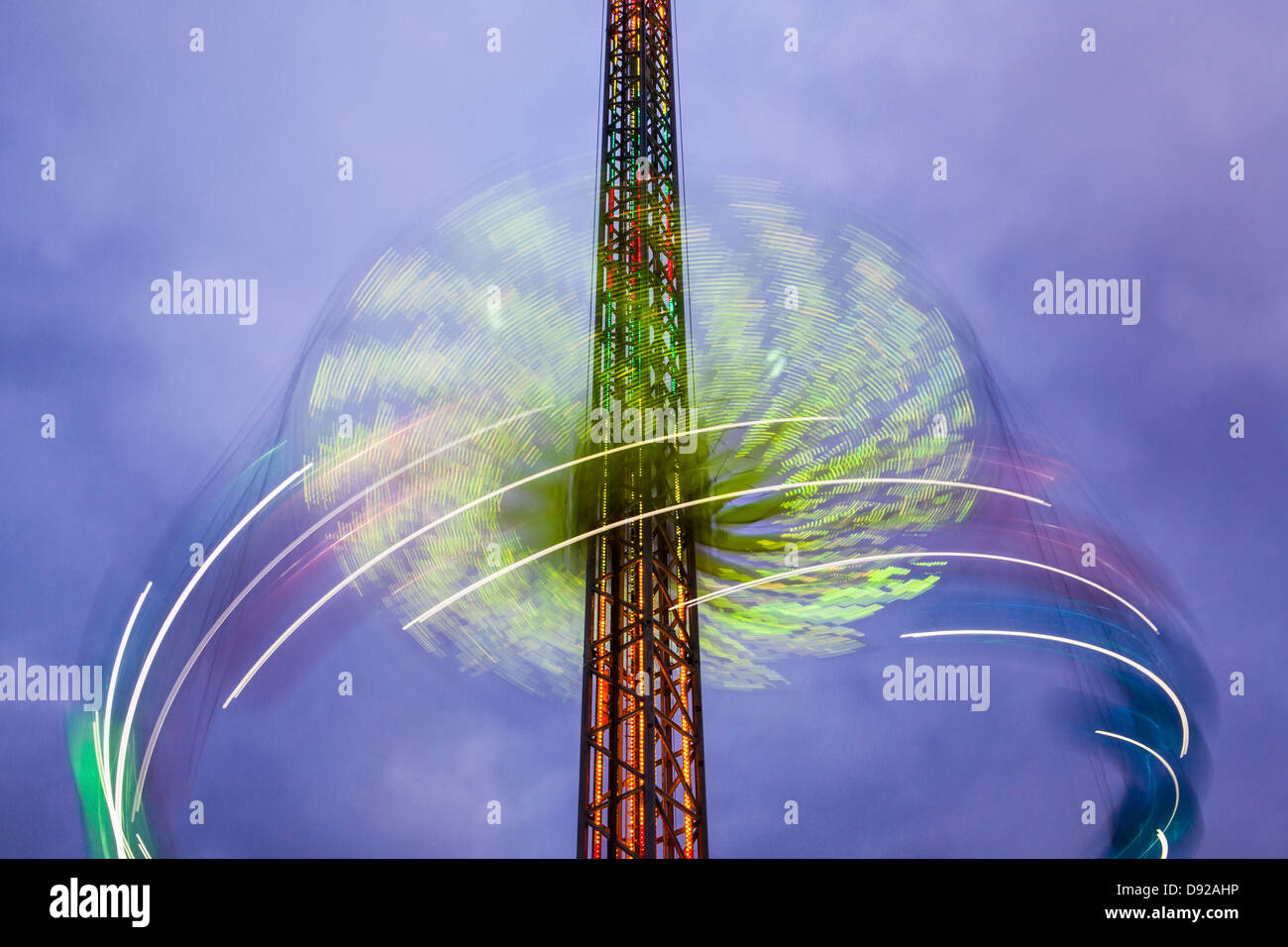 Ferris Wheel Fun. Slow shutter image of a moving ferris wheel in Prague ...