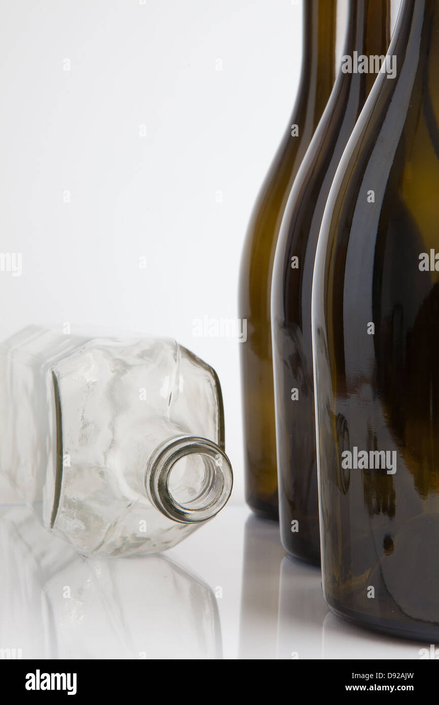 Four empty bottles of wine Stock Photo - Alamy