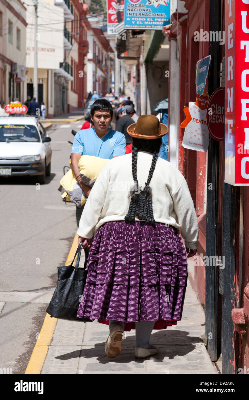 Indigenas with their traditional braided hair, Puno, Peru Stock Photo ...