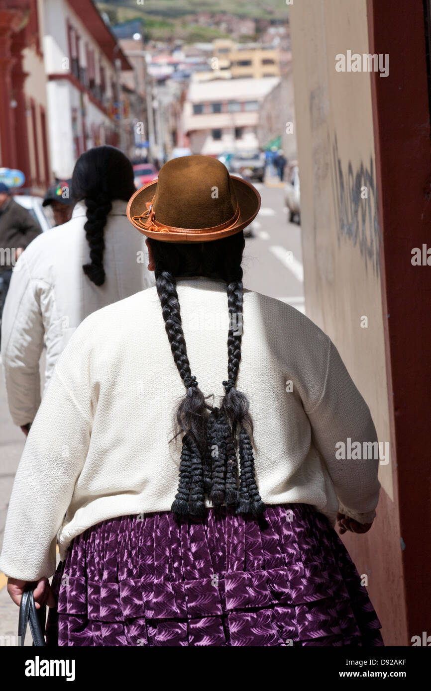 Indigenas with their traditional braided hair, Puno, Peru Stock Photo ...