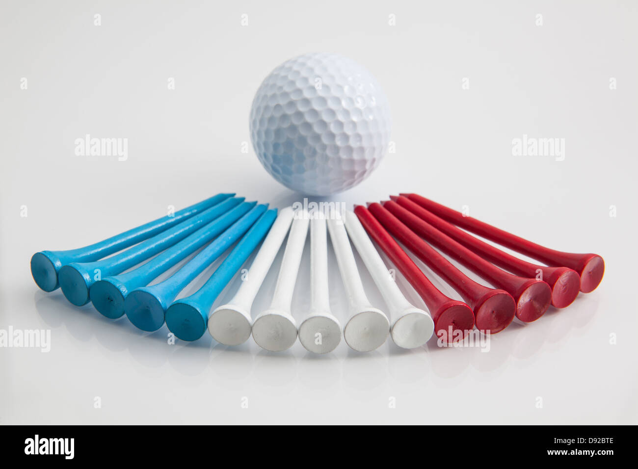 The different colorful wooden golf tees on the white background Stock ...