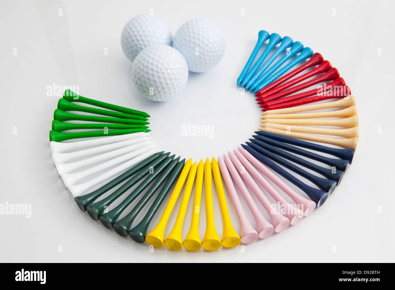 The different colorful wooden golf tees on the white background Stock ...
