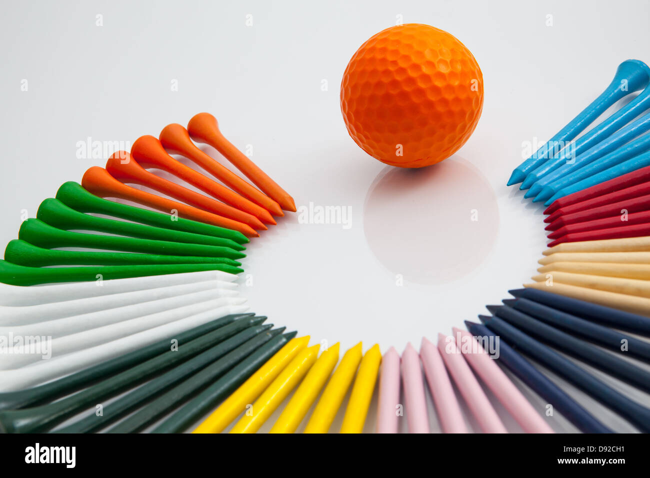 The different colorful wooden golf tees on the white background Stock ...