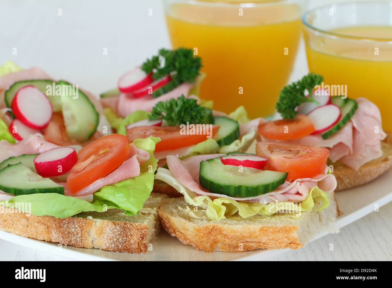 Sandwiches with ham and salad, close up Stock Photo - Alamy