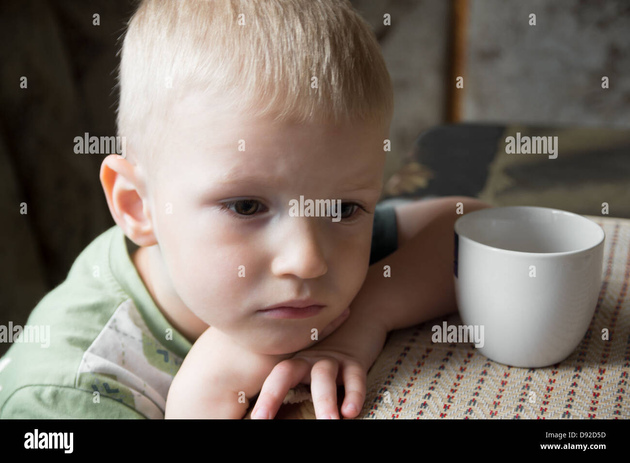 Sad upset tired worried little child (boy) close up portrait Stock ...