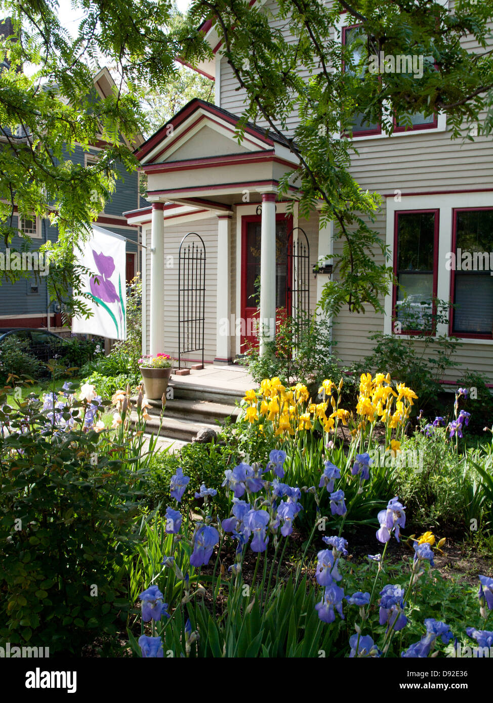 House with flowers Stock Photo - Alamy