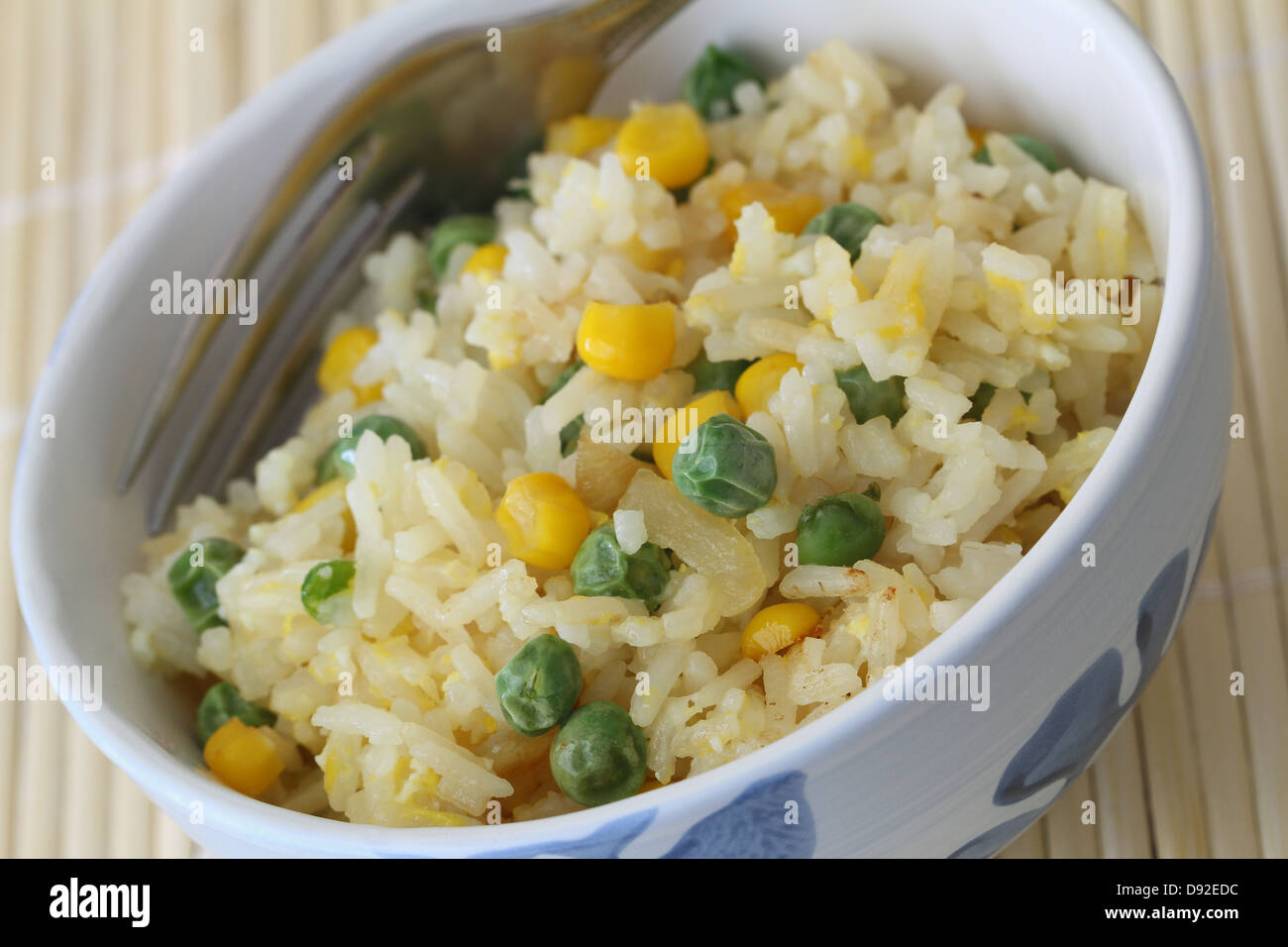 Fried rice with egg, green peas and sweetcorn Stock Photo - Alamy