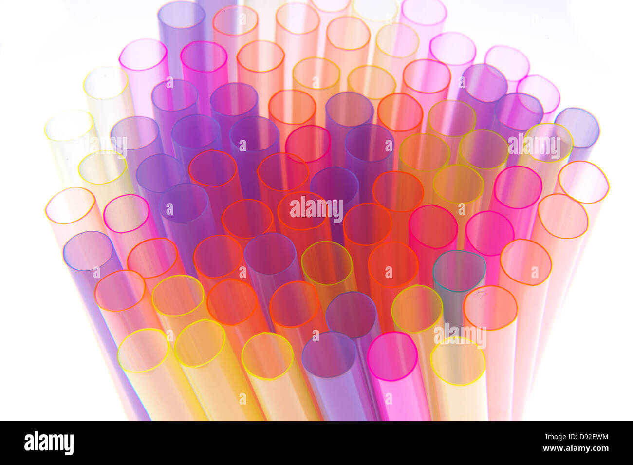 Macro view of multi-colored straws on white background Stock Photo - Alamy