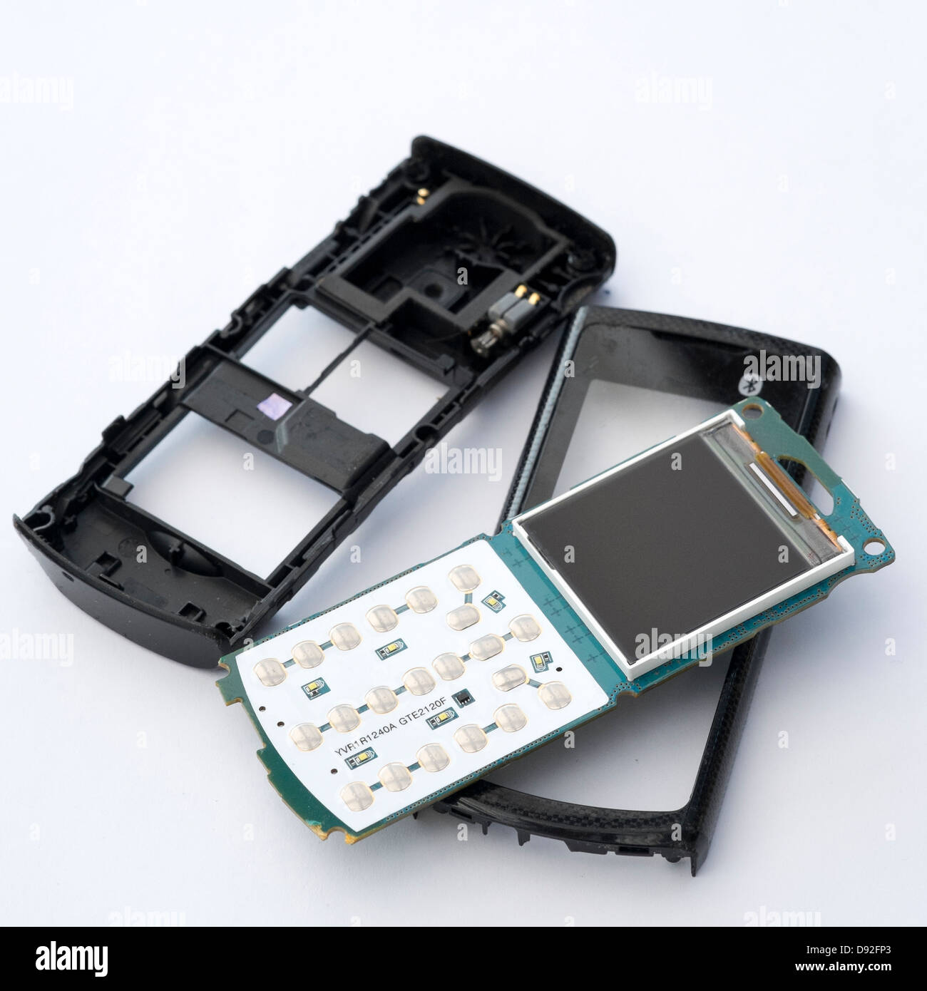 Broken mobile phone pieces Stock Photo - Alamy