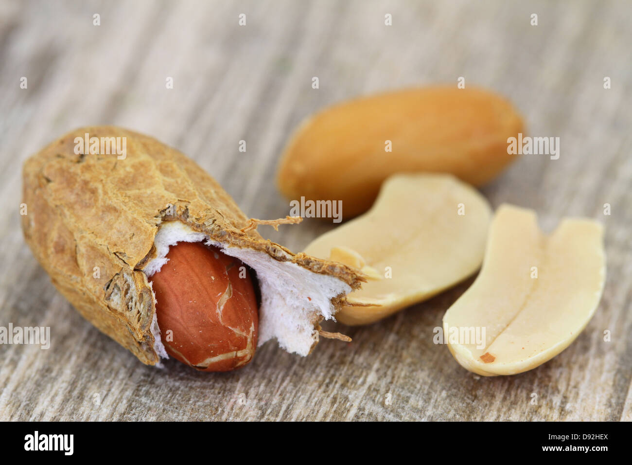 Peanuts with and without shell, close up Stock Photo - Alamy