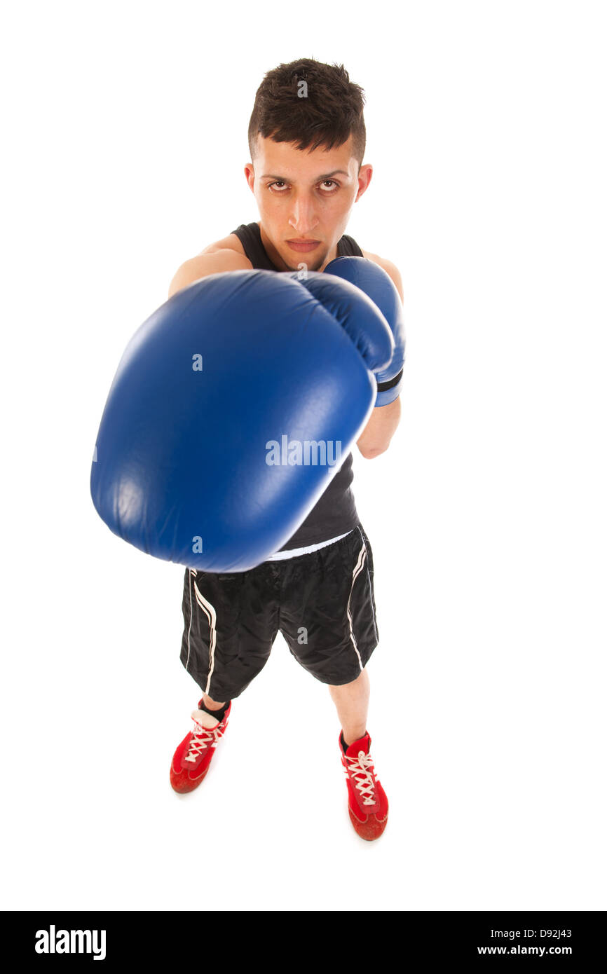 Boxing man with blue glovesis giving big punch Stock Photo - Alamy