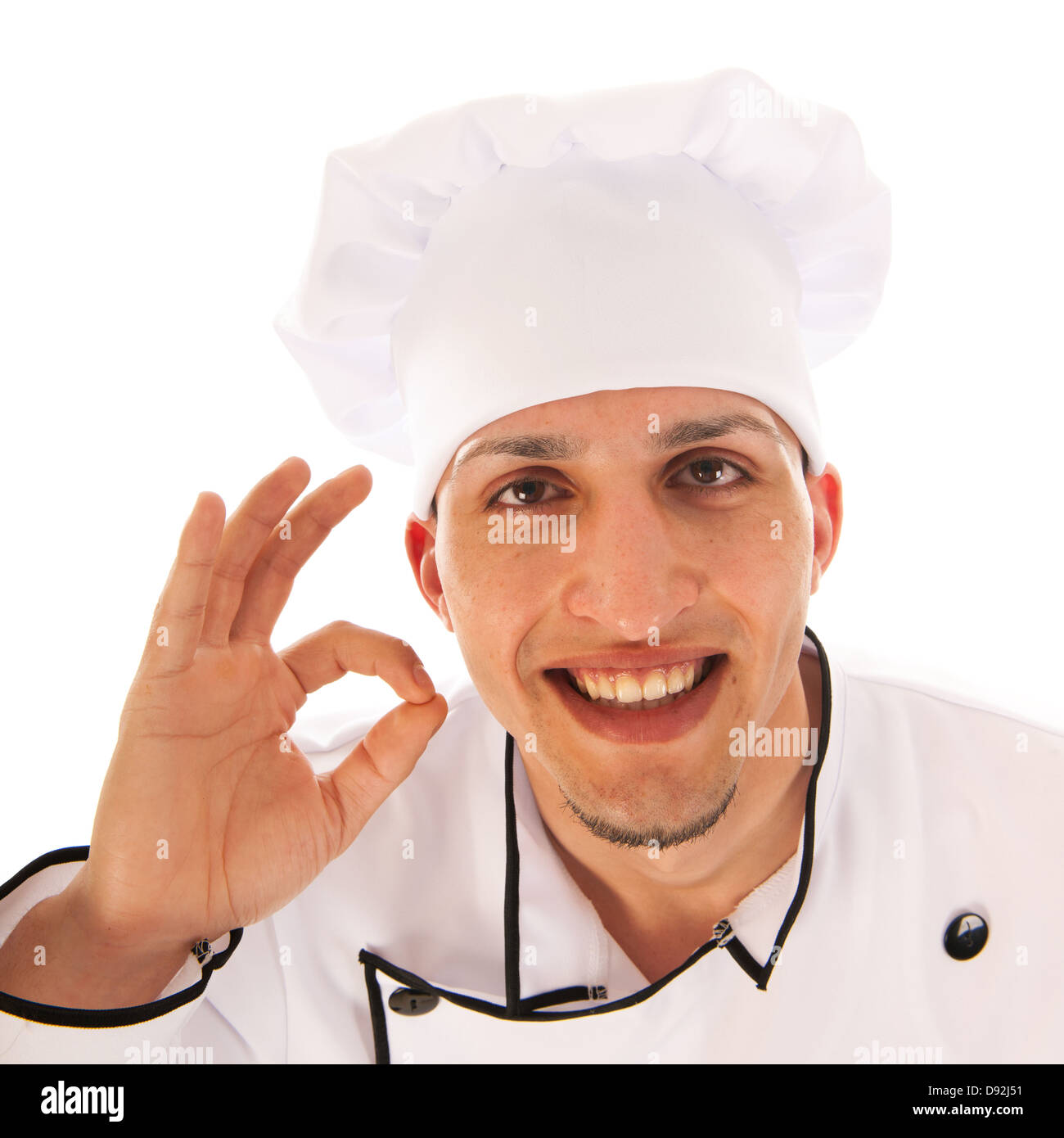 Cook making the ok sign for the food isolated over white background ...