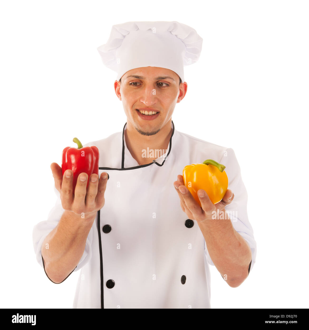 Cook with fresh paprikas choosing the right color isolated over white ...