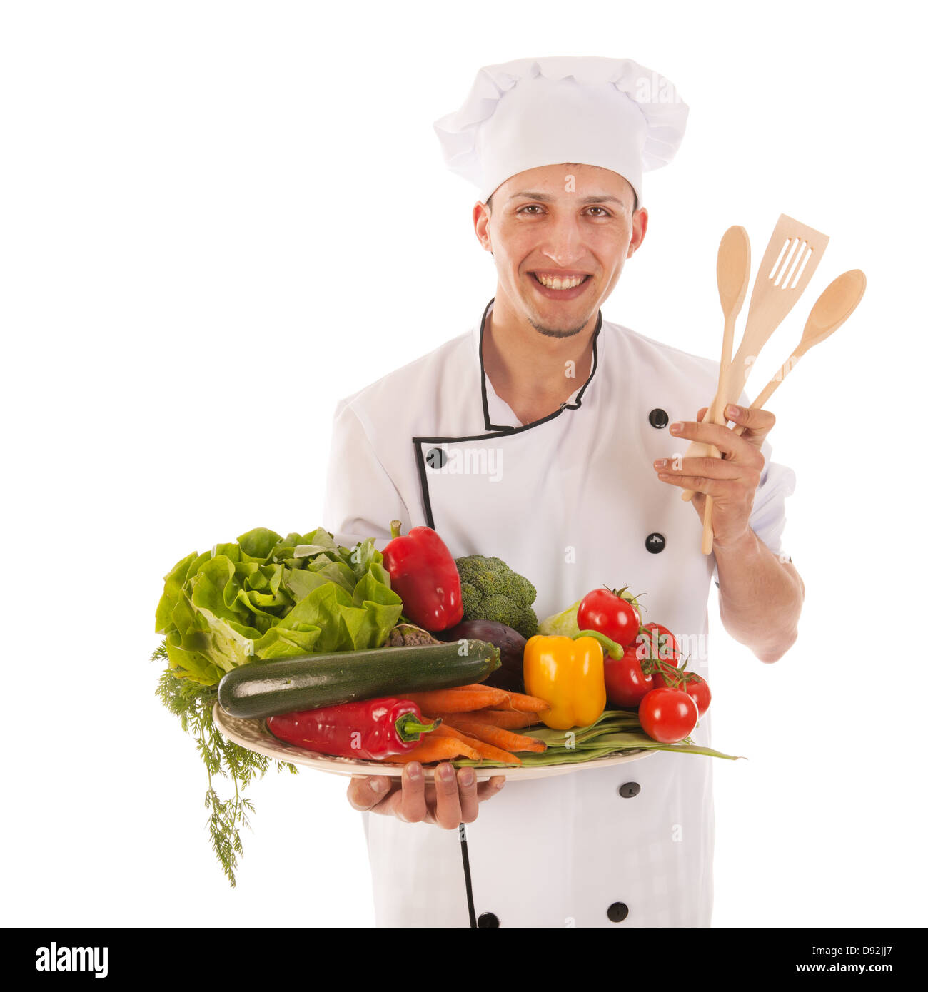 Cook with big assortment fresh vegetables isolated over white ... Cook with big assortment fresh vegetables isolated over white ...