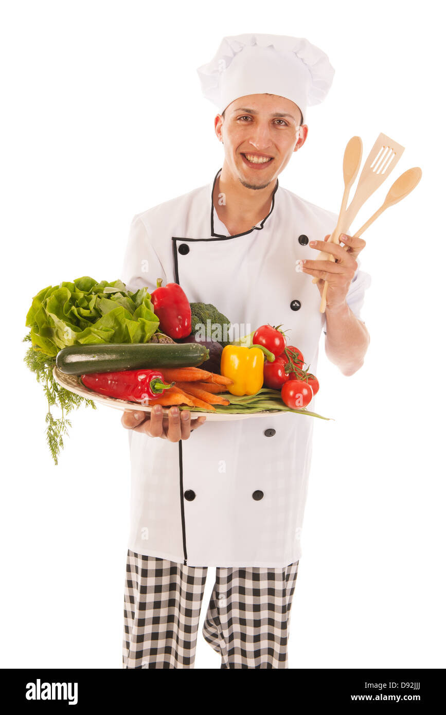 Cook with big assortment fresh vegetables isolated over white ... Cook with big assortment fresh vegetables isolated over white ...