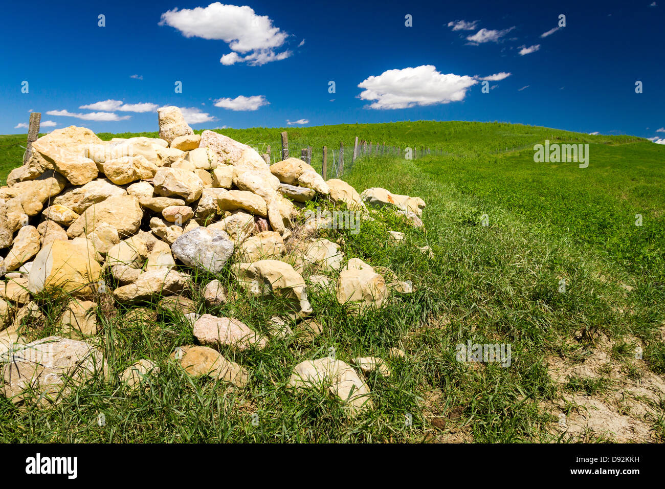 Pile of stones in Tuscany field at summer, Italy Stock Photo - Alamy