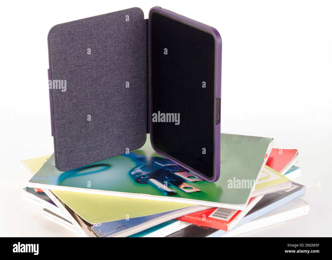 wireless device stacked on books Stock Photo - Alamy