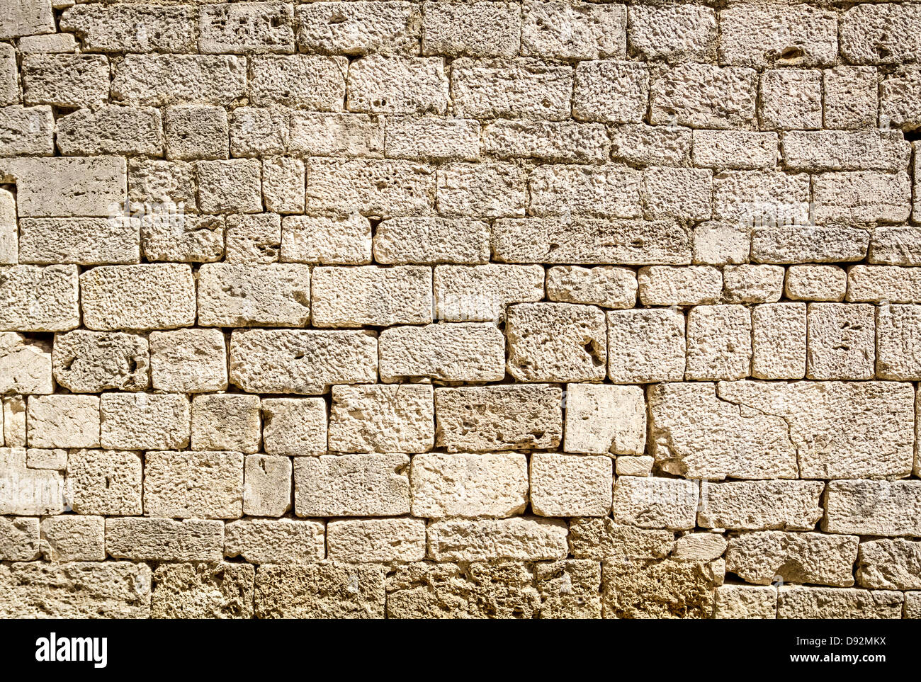 Ancient wall built of white stone Stock Photo - Alamy