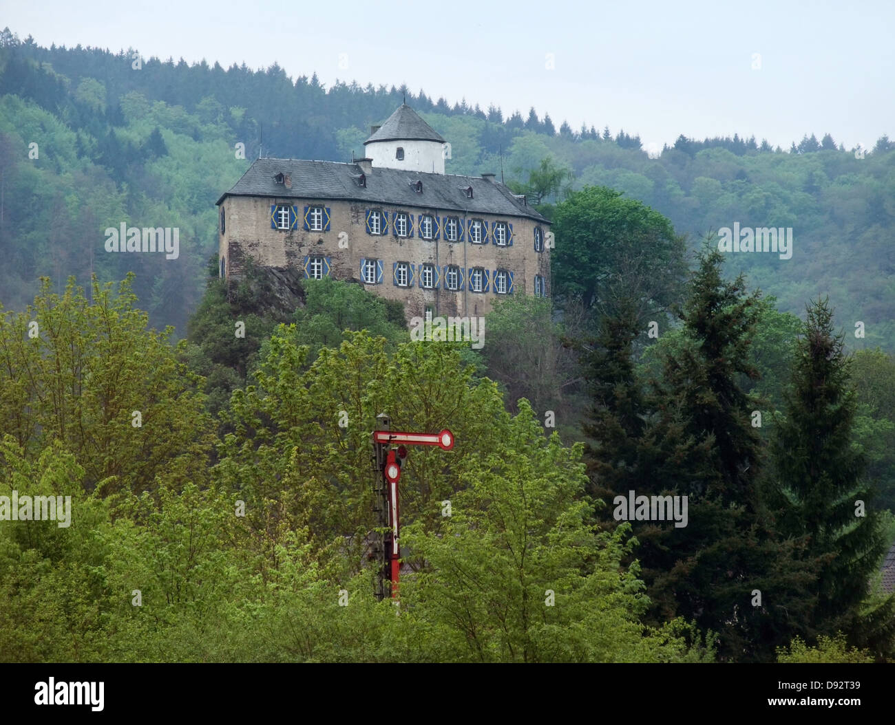 idyllic scenery showing a small castle in the Vulkan Eifel, wich is a ...