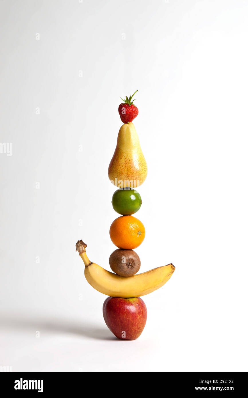 Fruit arranged in a stack Stock Photo - Alamy