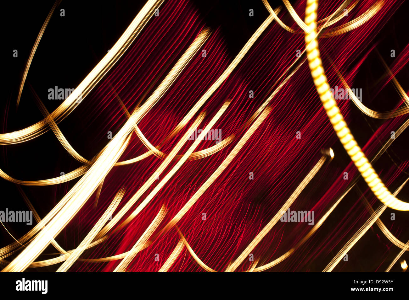 Vibrant red and gold abstract light painting Stock Photo - Alamy