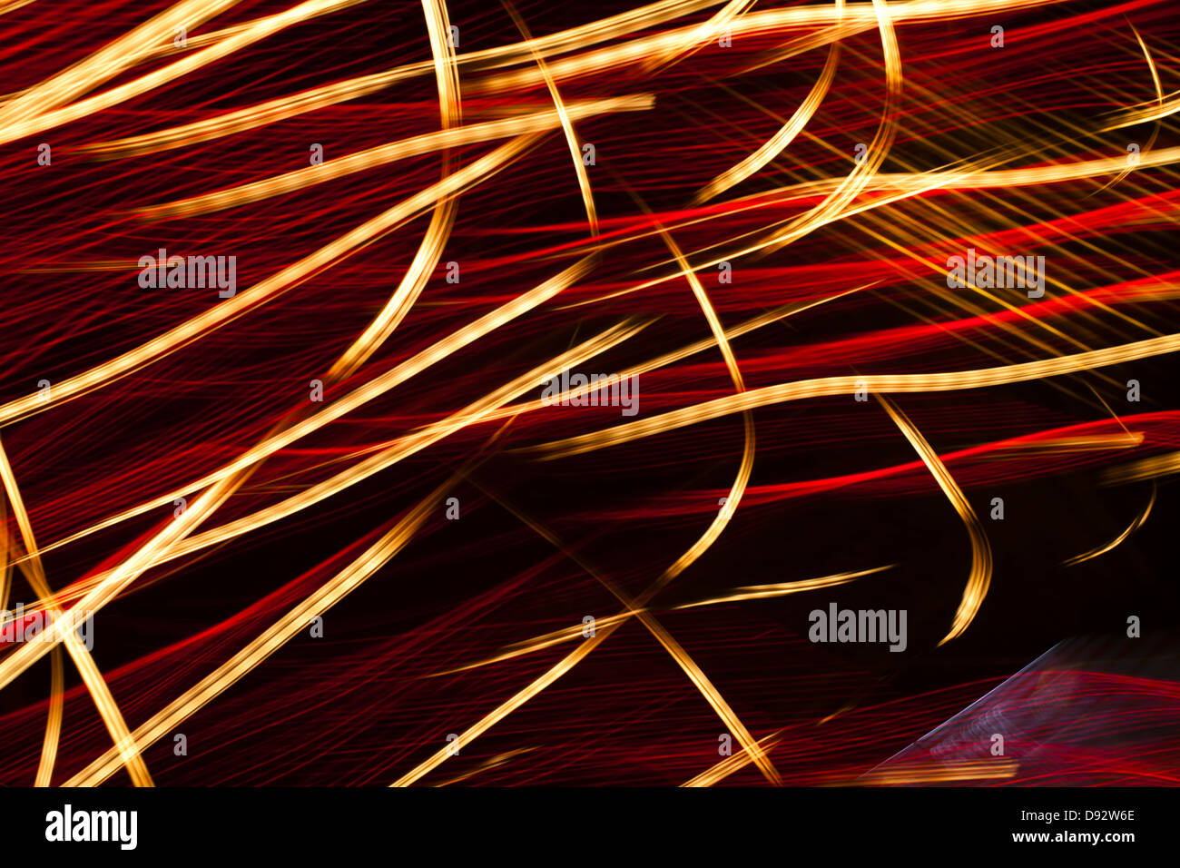 Vibrant red and gold abstract light painting Stock Photo - Alamy
