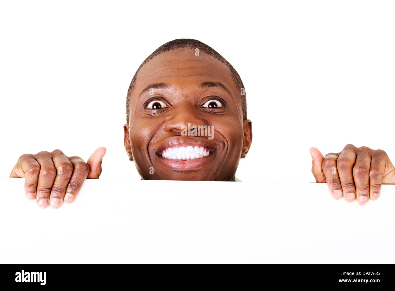 Happy successful businessman holding and showing blank advertisement ...