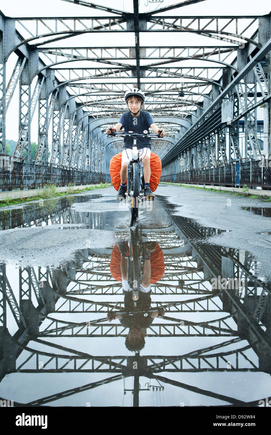 Boy riding his bicycle hi-res stock photography and images - Alamy