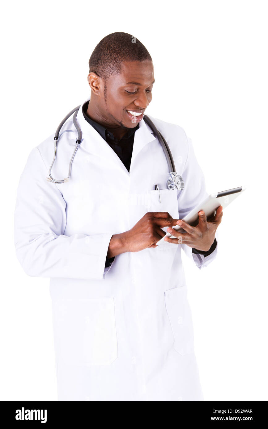 Smiling doctor using a tablet computer isolated on a white background ...
