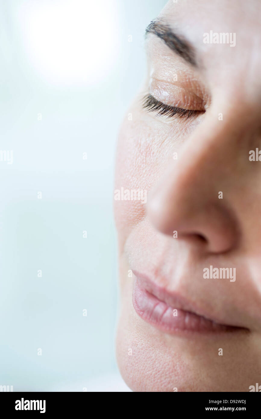 Close-up of woman napping Stock Photo - Alamy