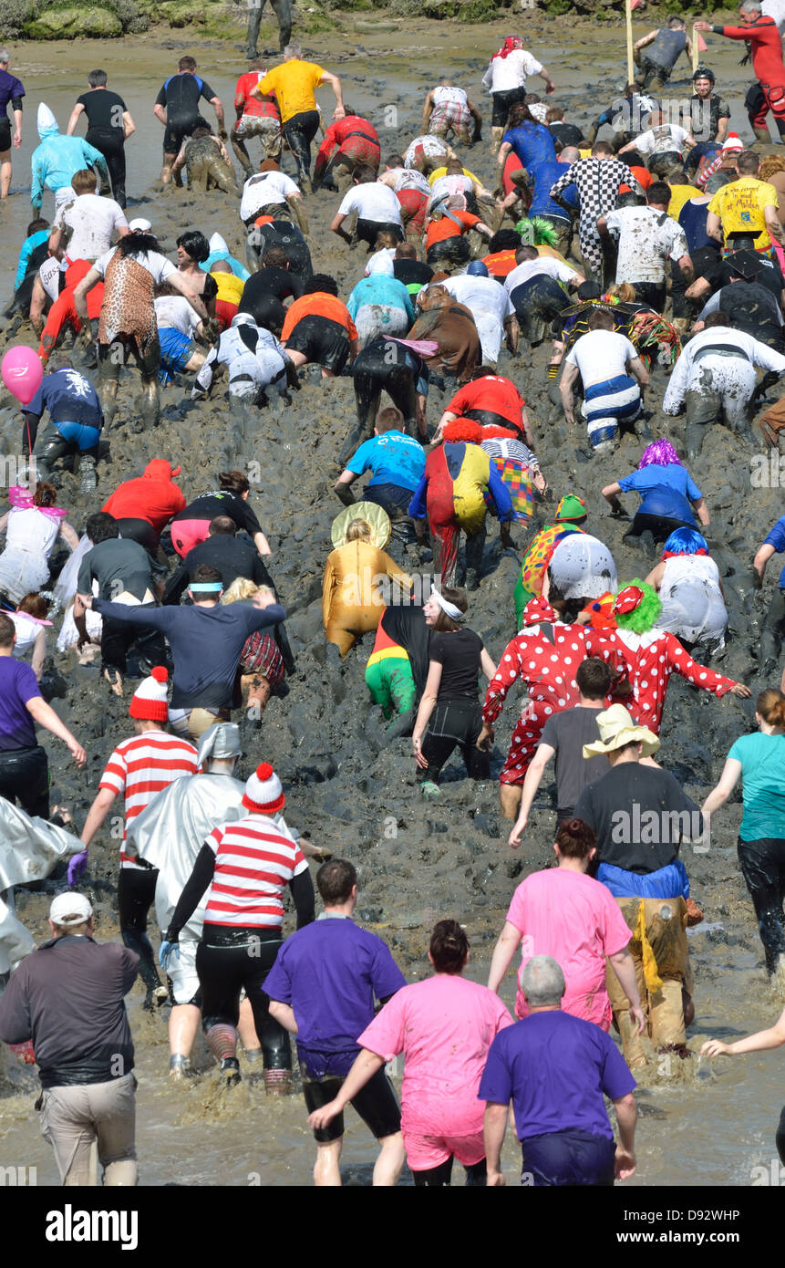 People running in Maldon mud race Stock Photo - Alamy