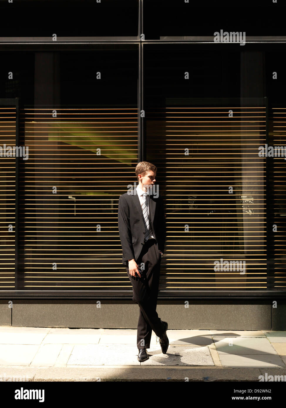 One person outside a building hi-res stock photography and images - Alamy