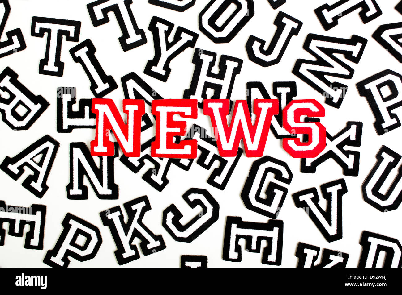 Red outlined varsity font stickers spelling News on top of black ...