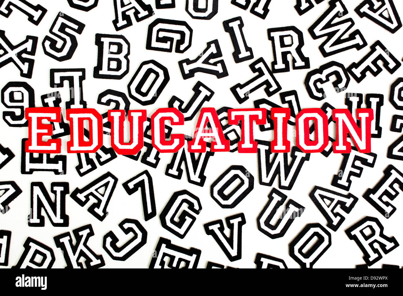 Red outlined varsity font stickers spelling Education on top of black ...