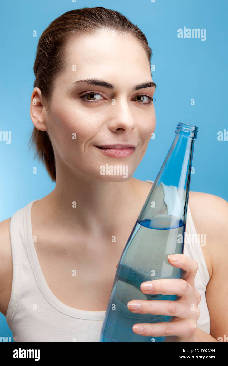 Woman holding a glass of water hi-res stock photography and images - Alamy