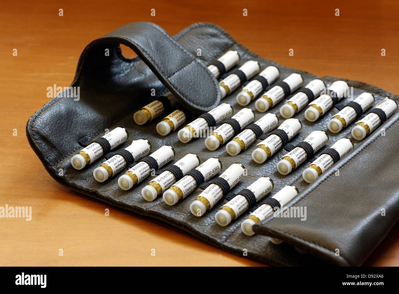 A case of small vials of homeopathic medicines Stock Photo - Alamy