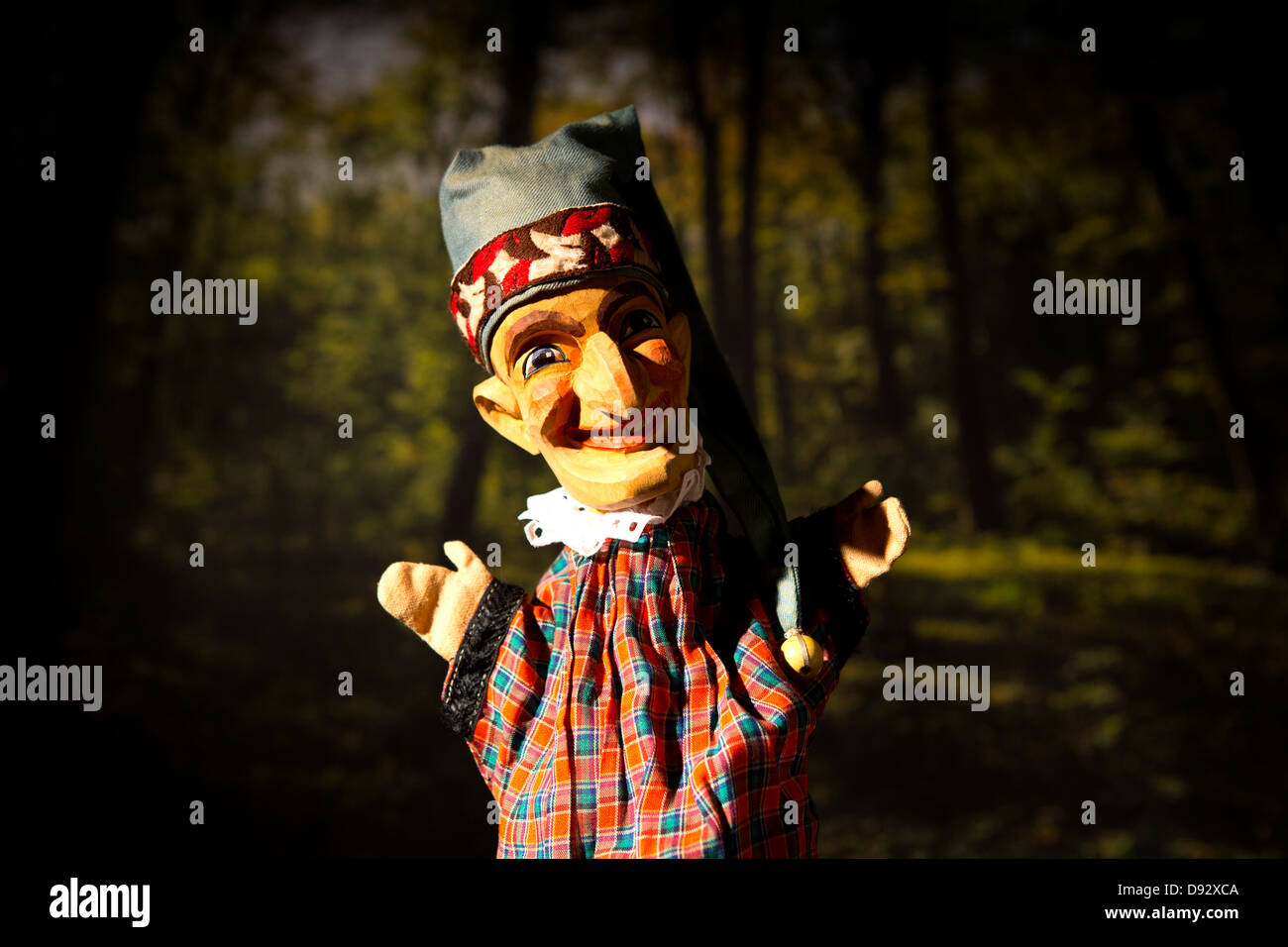 Punch from the classic puppet show Punch and Judy standing on stage ...