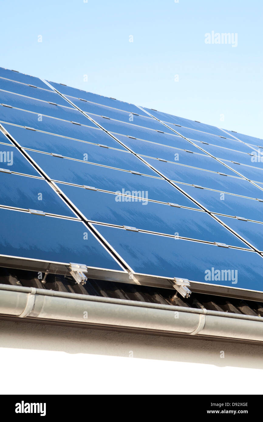 Rows of solar panels, low angle view, close-up Stock Photo - Alamy