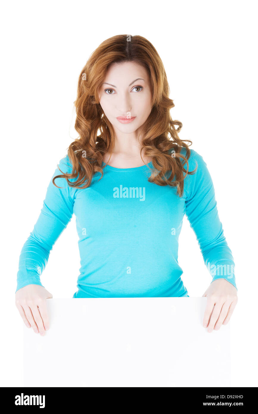 Woman looking signboard white hi-res stock photography and images - Alamy