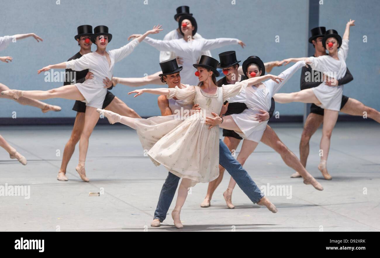 Dancer Carsten Jung and member of the dance ensemble dance on stage ...