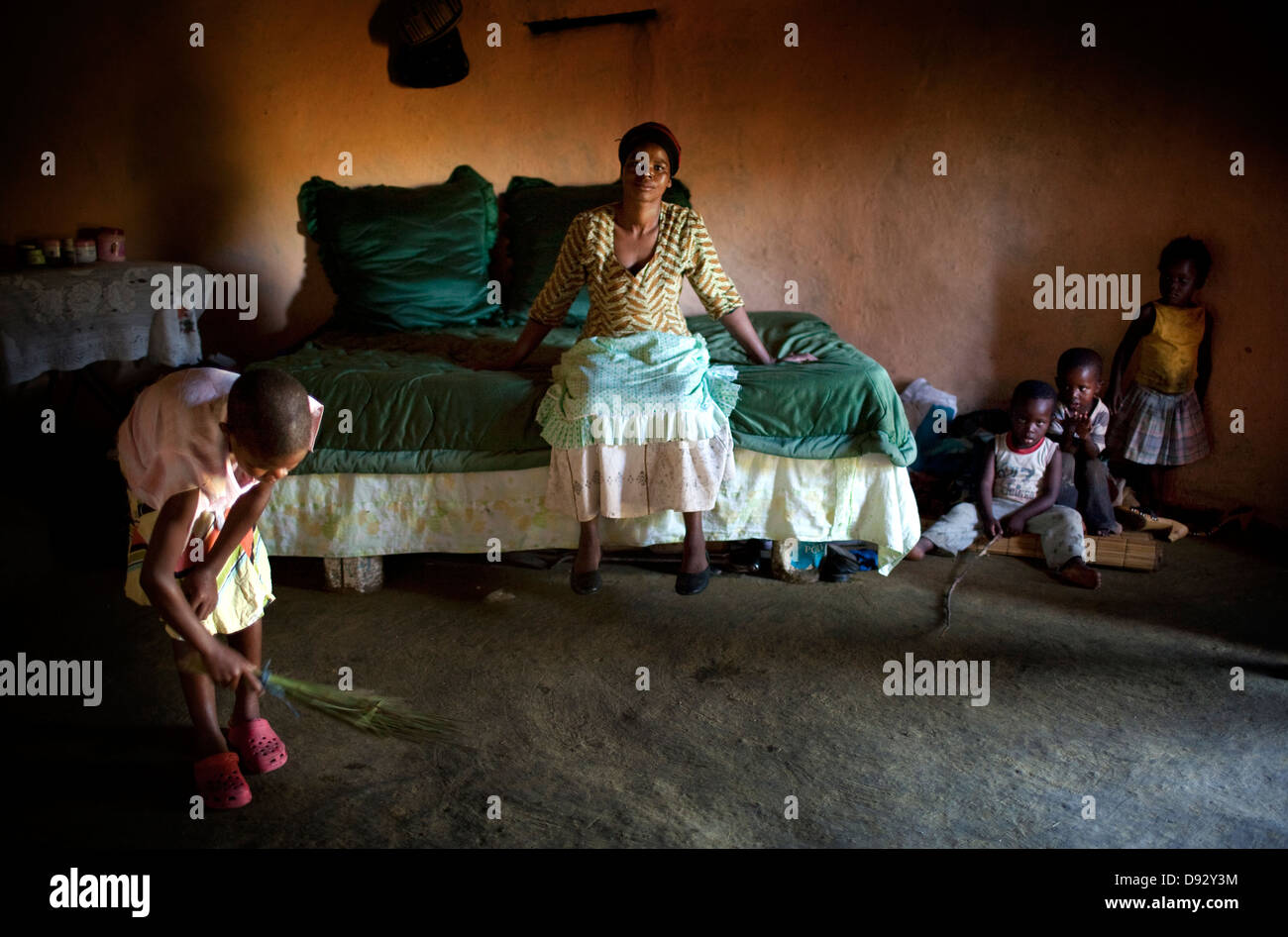 Woman sweeping africa hi-res stock photography and images - Alamy